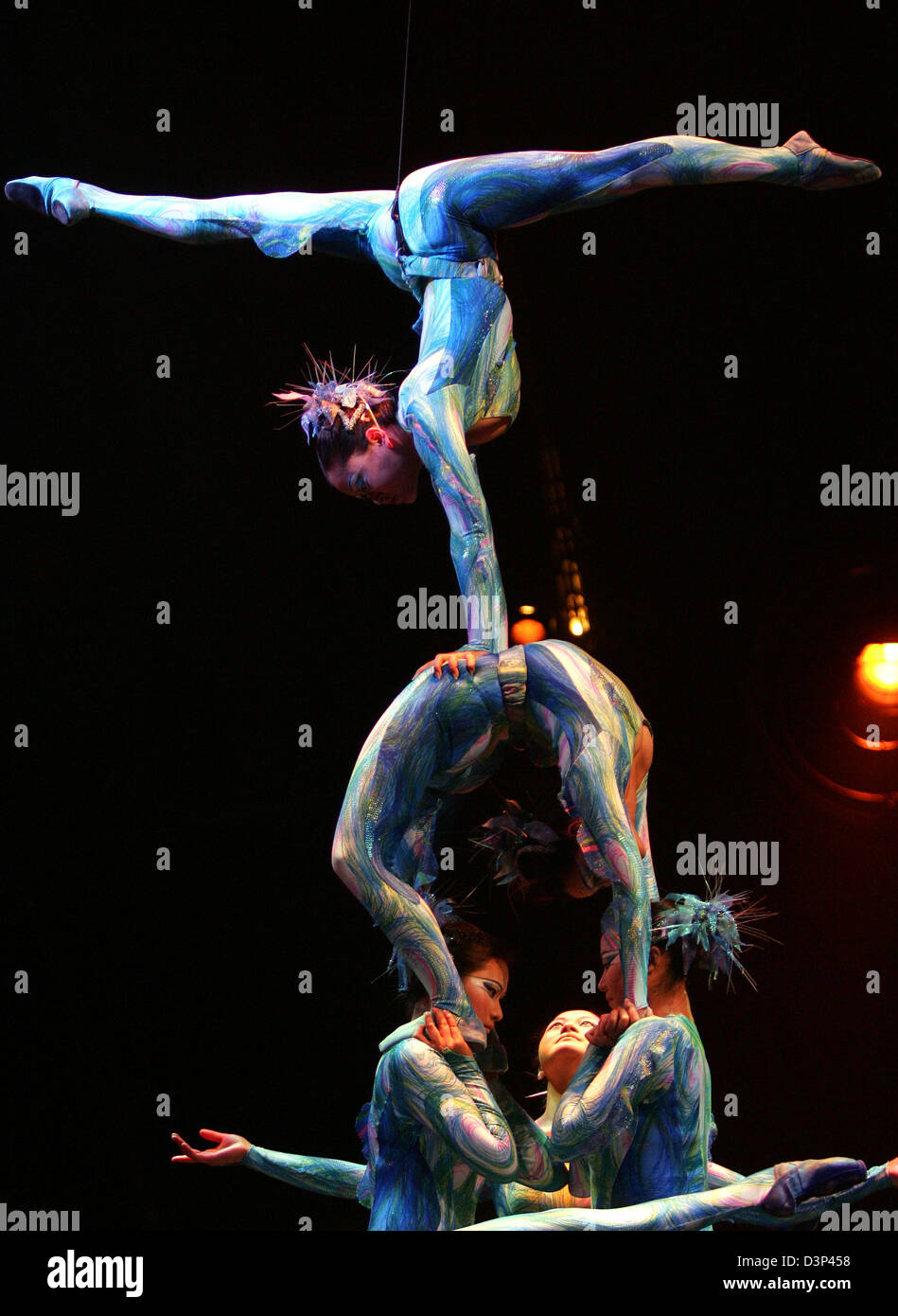 Artists of the world-famous Cirque du Soleil perform during a photo ...