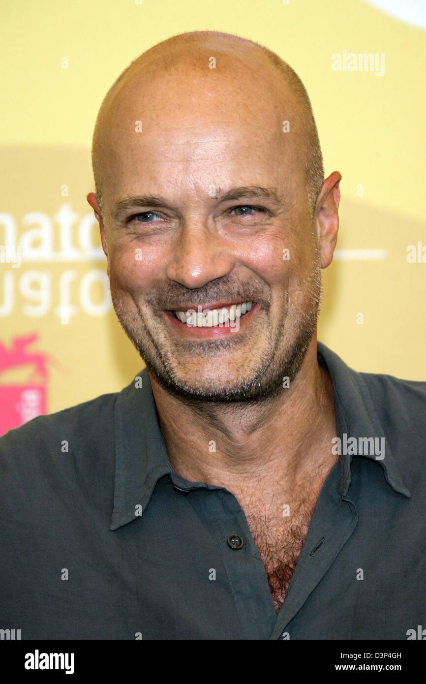 German actor Christian Berkel smiles for photographers arriving for his ...
