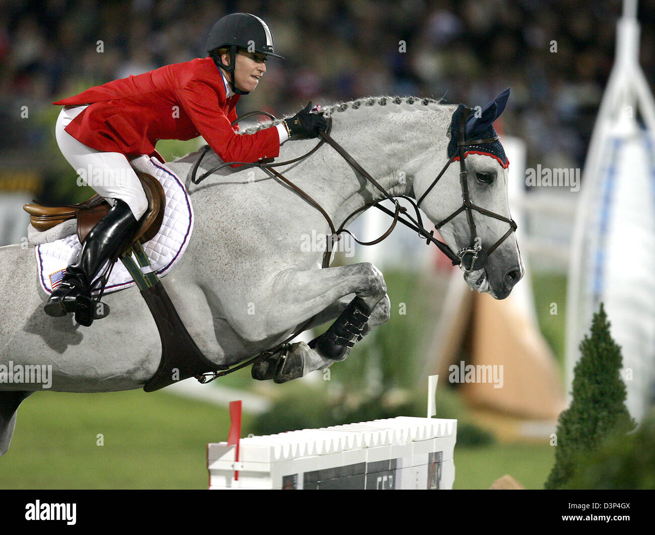US show jumper Laura Kraut and her horse 'Miss Independent' take an ...