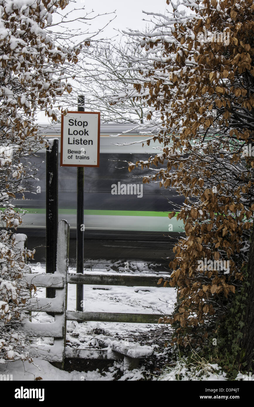 Railway in snow passing hi-res stock photography and images - Alamy