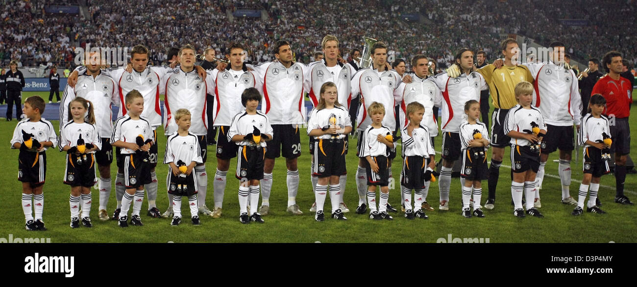 The German side pictured singing the national anthem before the Euro ...