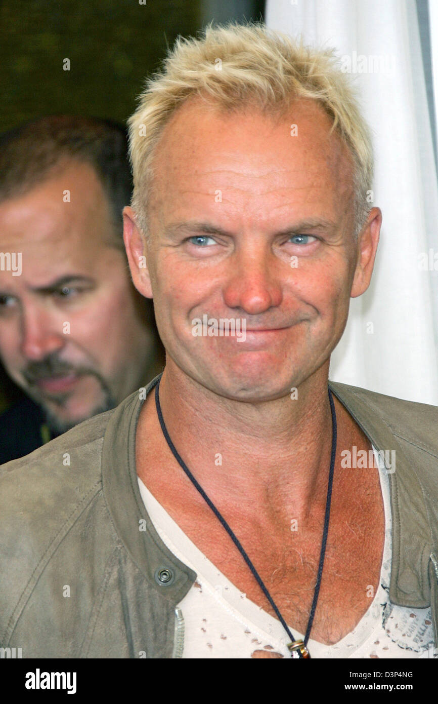 British musician, actor and producer Sting smiles for the cameras at a ...