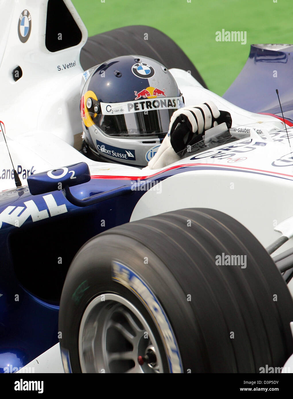 German Formula One test pilot Sebastian Vettel of BMW Sauber steers his ...