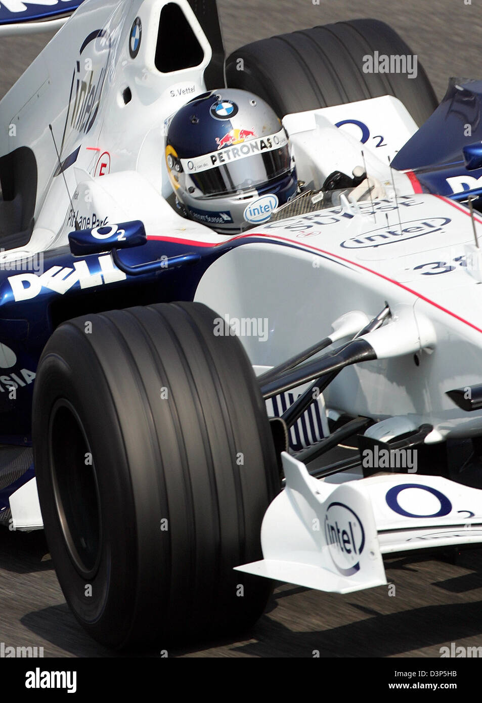 German Formula One test pilot Sebastian Vettel of BMW Sauber steers his ...