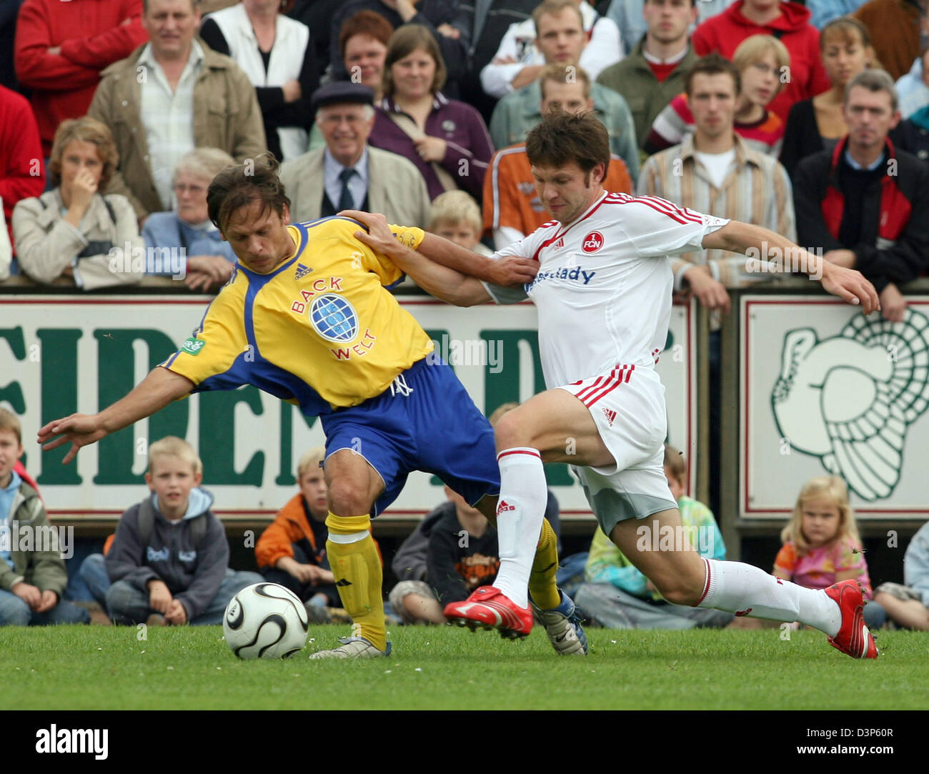 Cloppenburg's Alket Zego (L) and Nuremberg's Ivan Saenko shown in ...