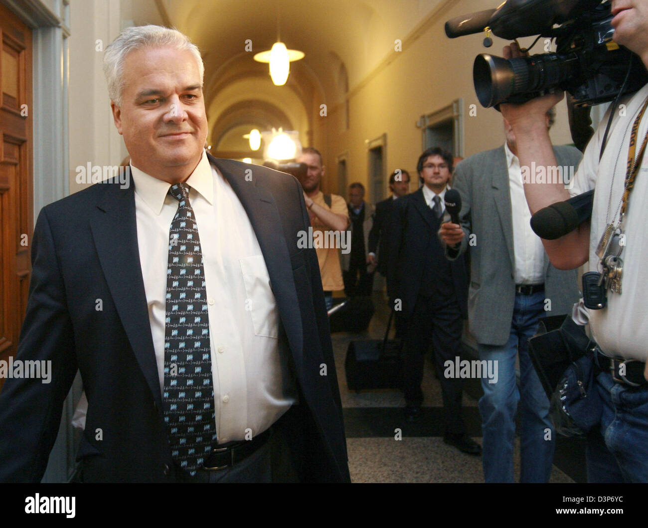 Alternative medic and cancer physician Dr. Matthias Rath (L) arrives at ...