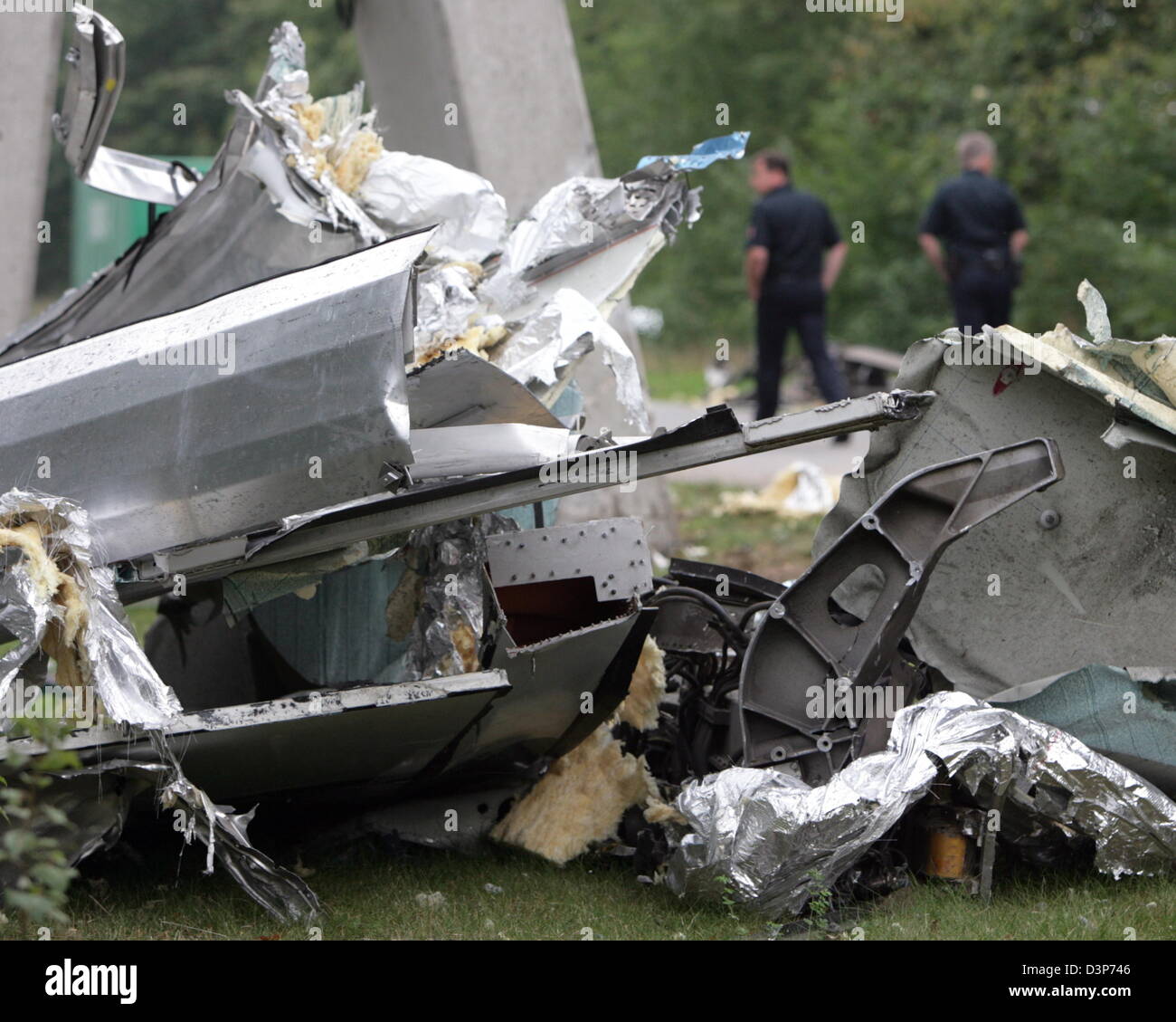 Pieces od debris lie under the 'Transrapid' maglev train track in ...