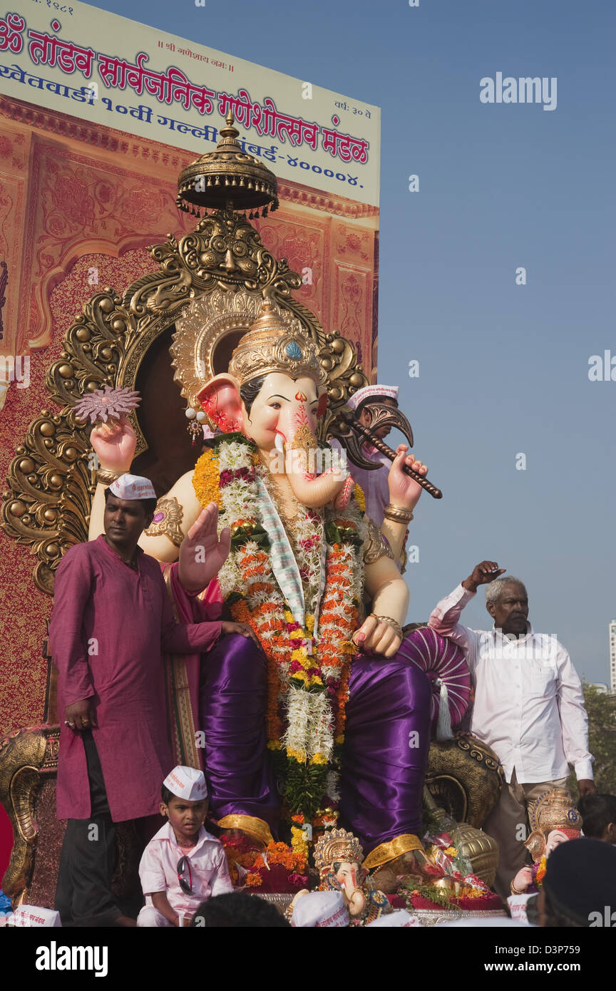 People at religious procession during Ganpati visarjan ceremony, Mumbai ...