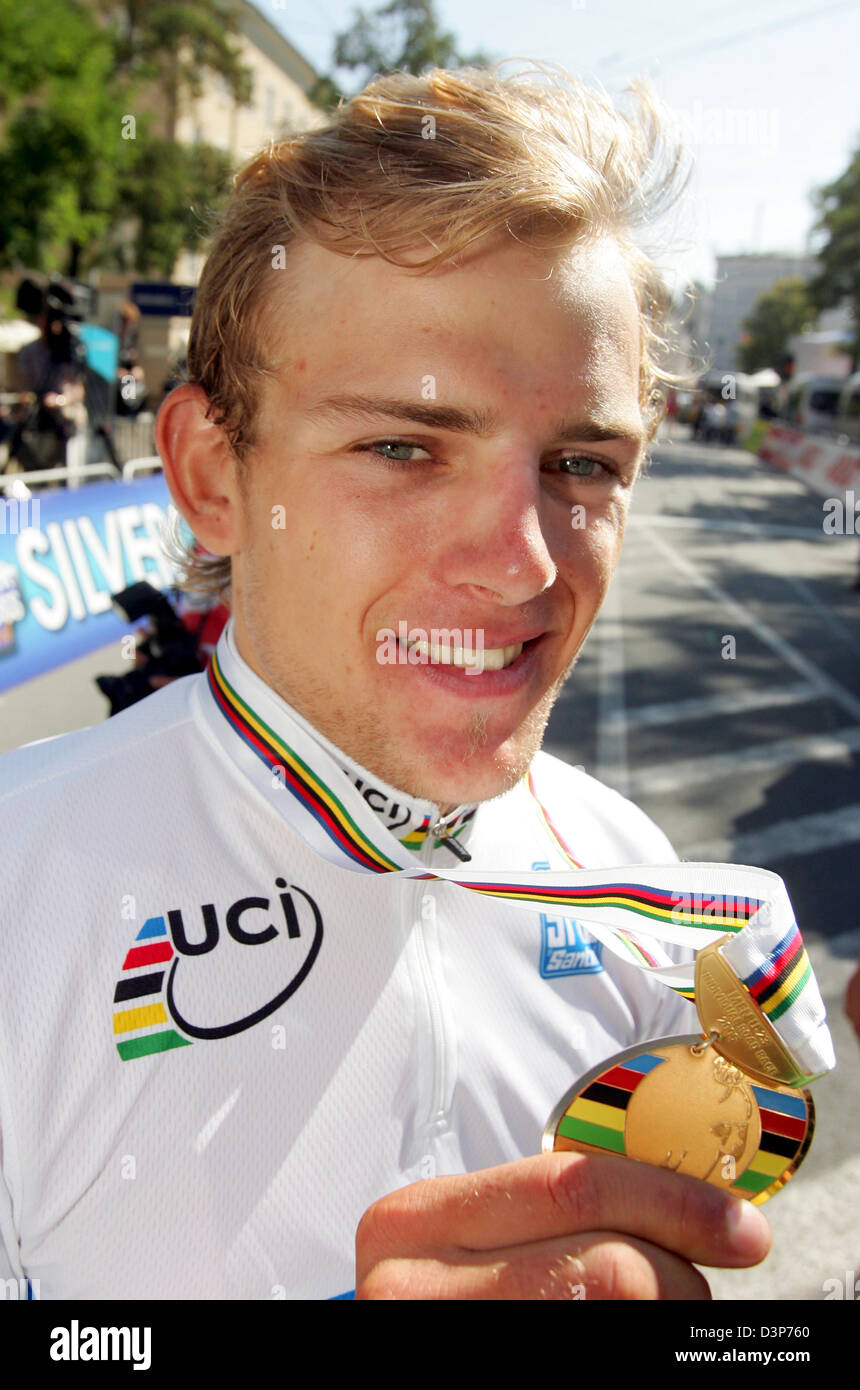 German cyclist Gerald Ciolek presents his gold medal after the under-23 ...