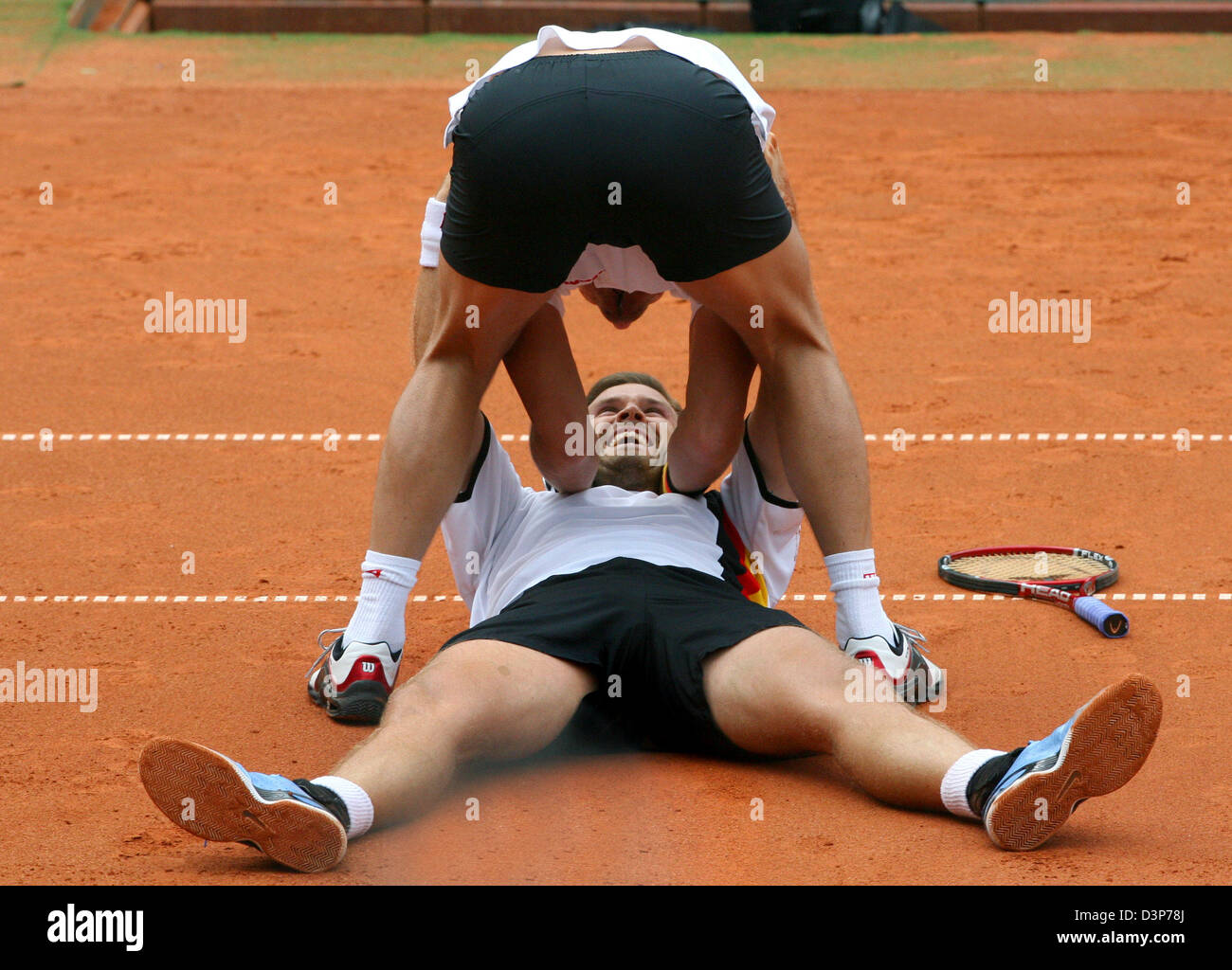 German tennis pro Alexander Waske (bottom) and team captain Patrick ...