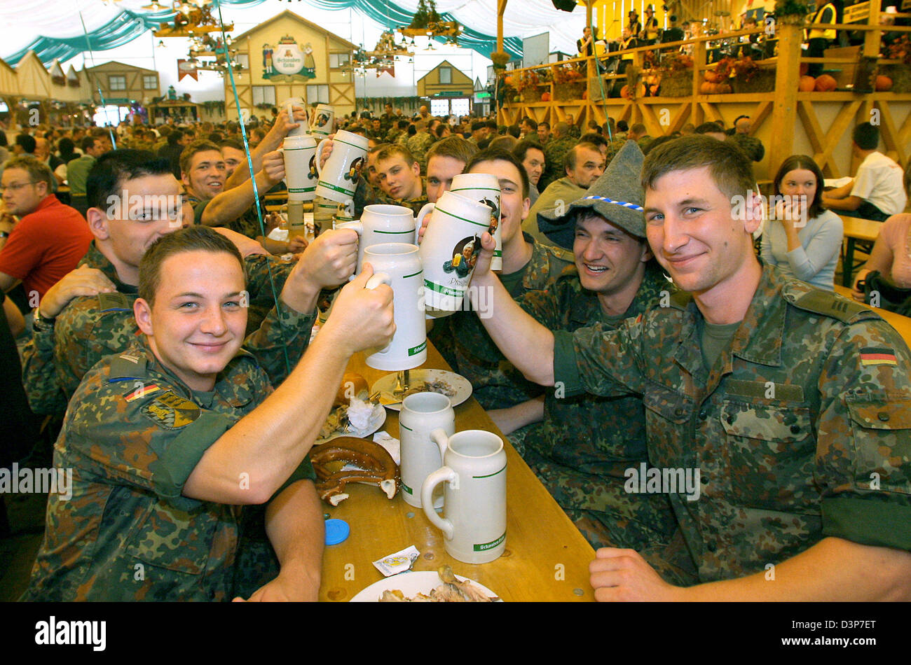 German Bundeswehr soldiers celebrate with beer in the scope of the ...