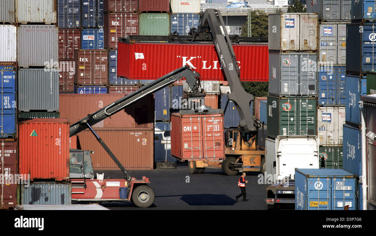 Containers are loaded with a special lifting crane at the transloading ...