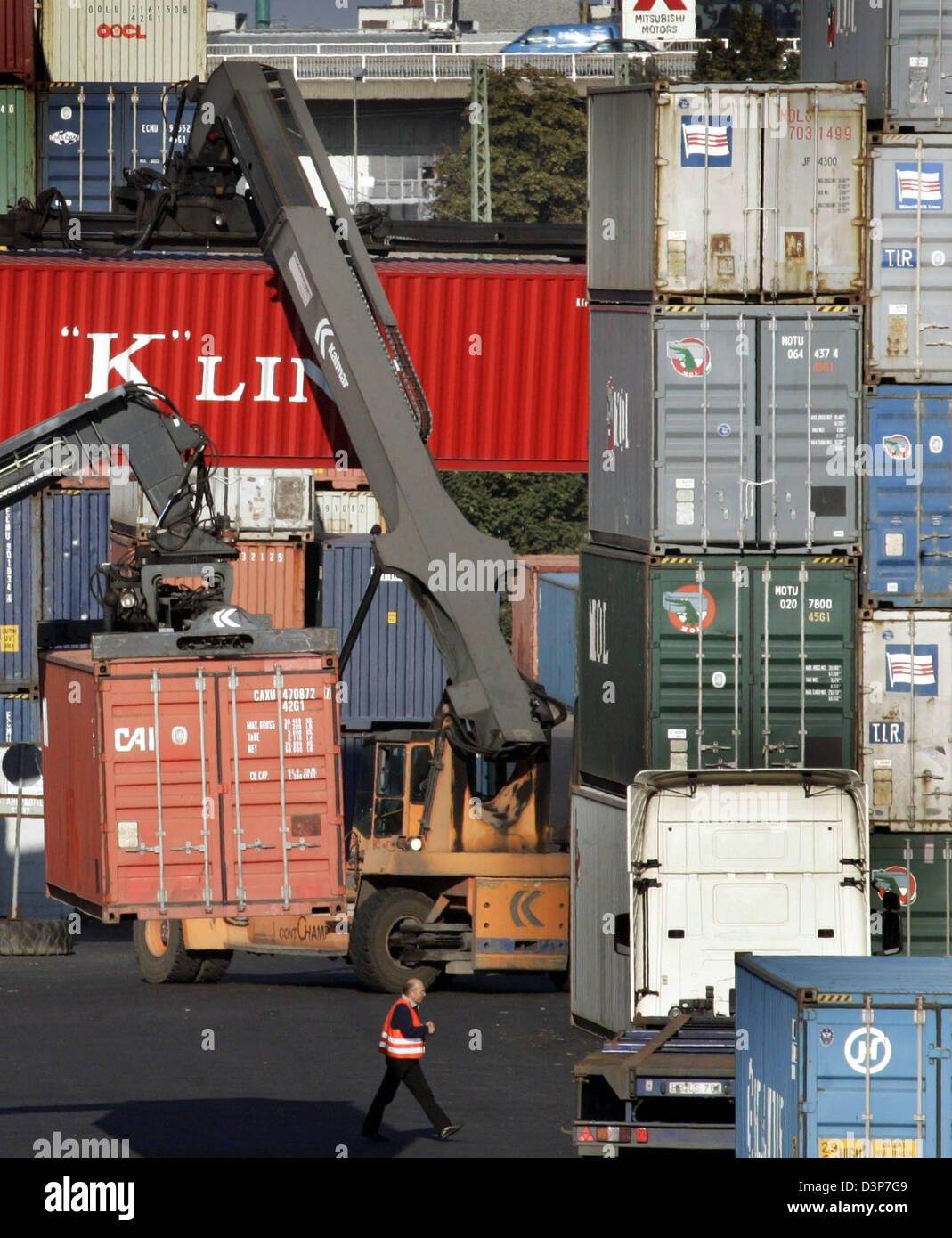 Containers are loaded with a special lifting crane at the transloading ...