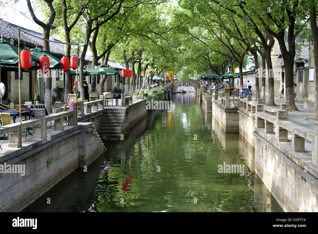 The photo shows one of the typical canals and a bridge in Tongli, China ...