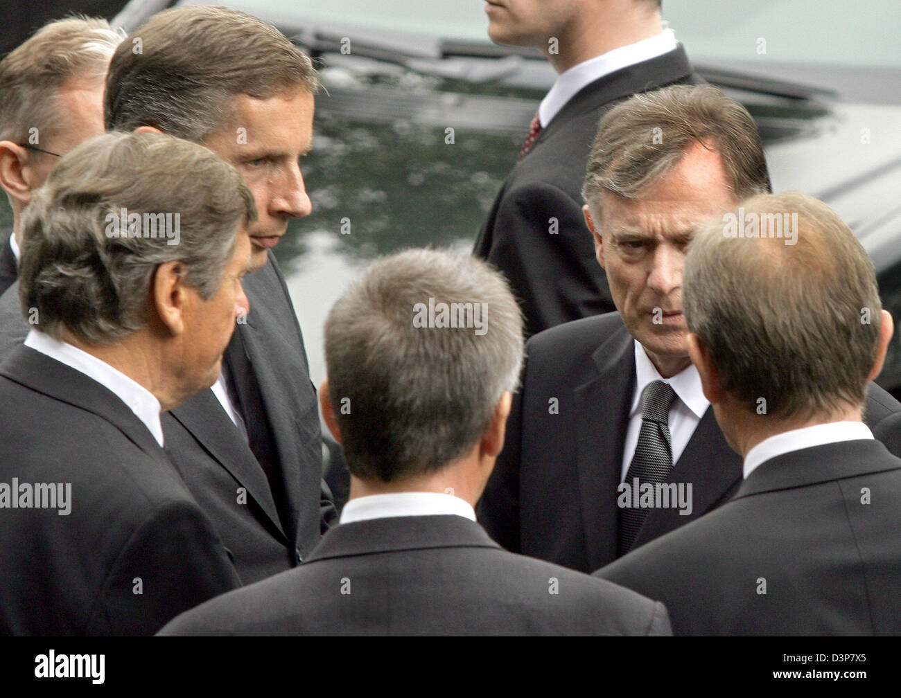 German President Horst Koehler and other guests leave the funeral ...
