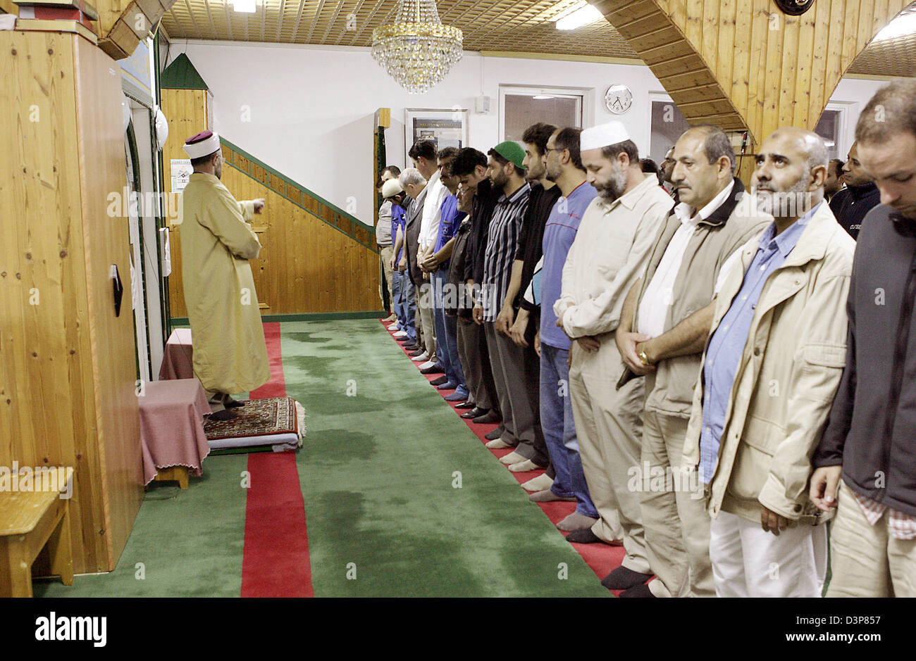 Muslims pray the evening prayer in the mosque 'Kuba' aka 'Islamic ...
