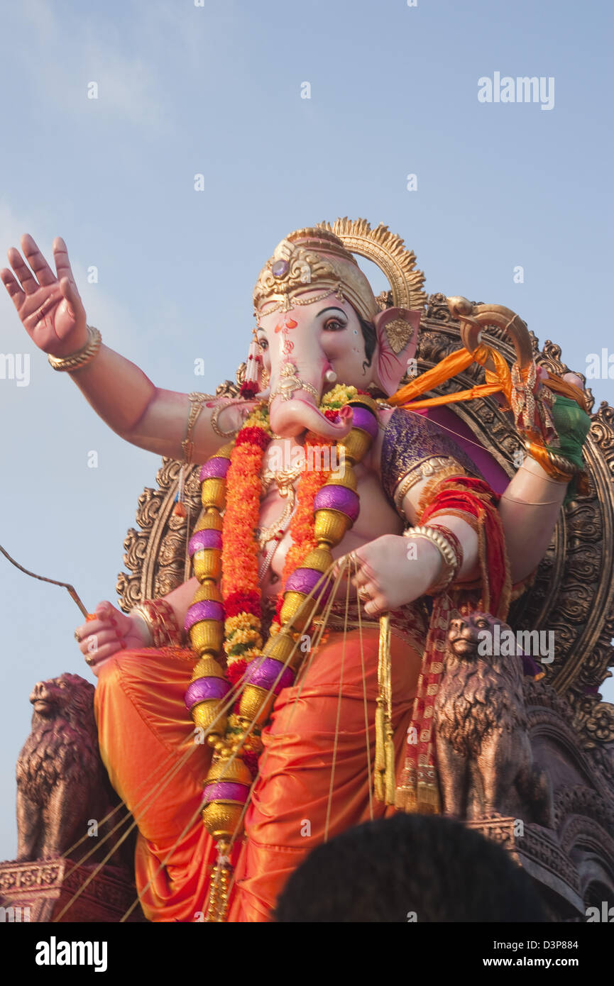 Idol of Lord Ganesha at religious procession during Ganpati visarjan ...