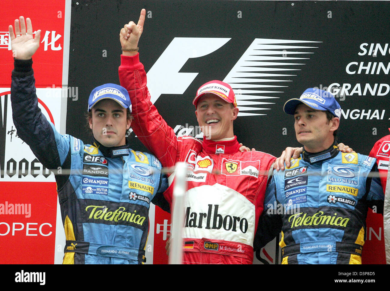 Formula One pilots German Michael Schumacher (C) of Scuderia Ferrari ...