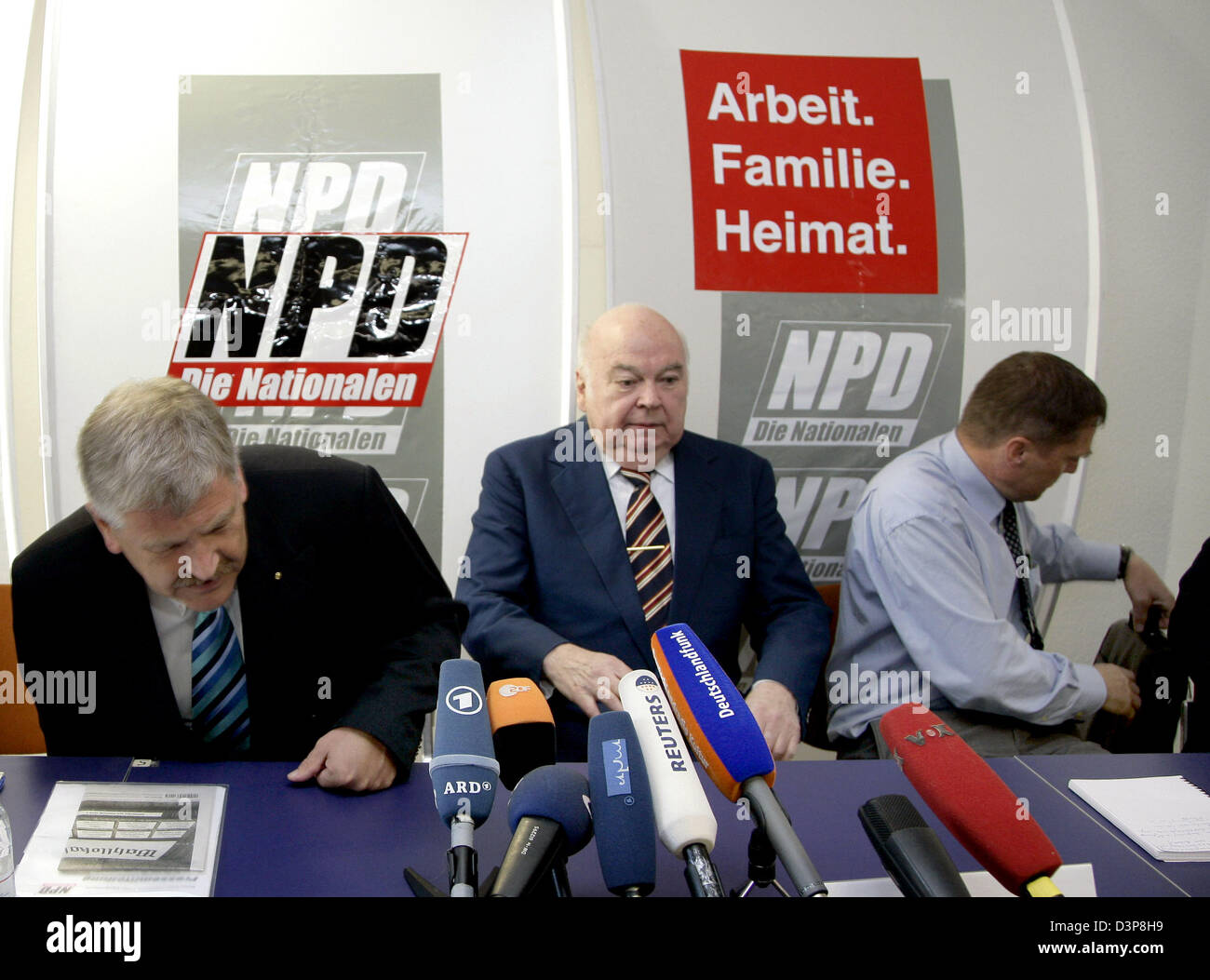 NPD chairman Udo Voigt (L-R), DVU chairman Gerhard Frey and the NPD ...