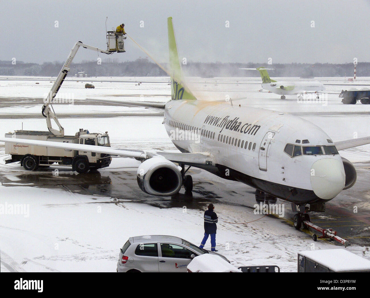 FILE - The picture shows the defrosting of an airplane with special ...