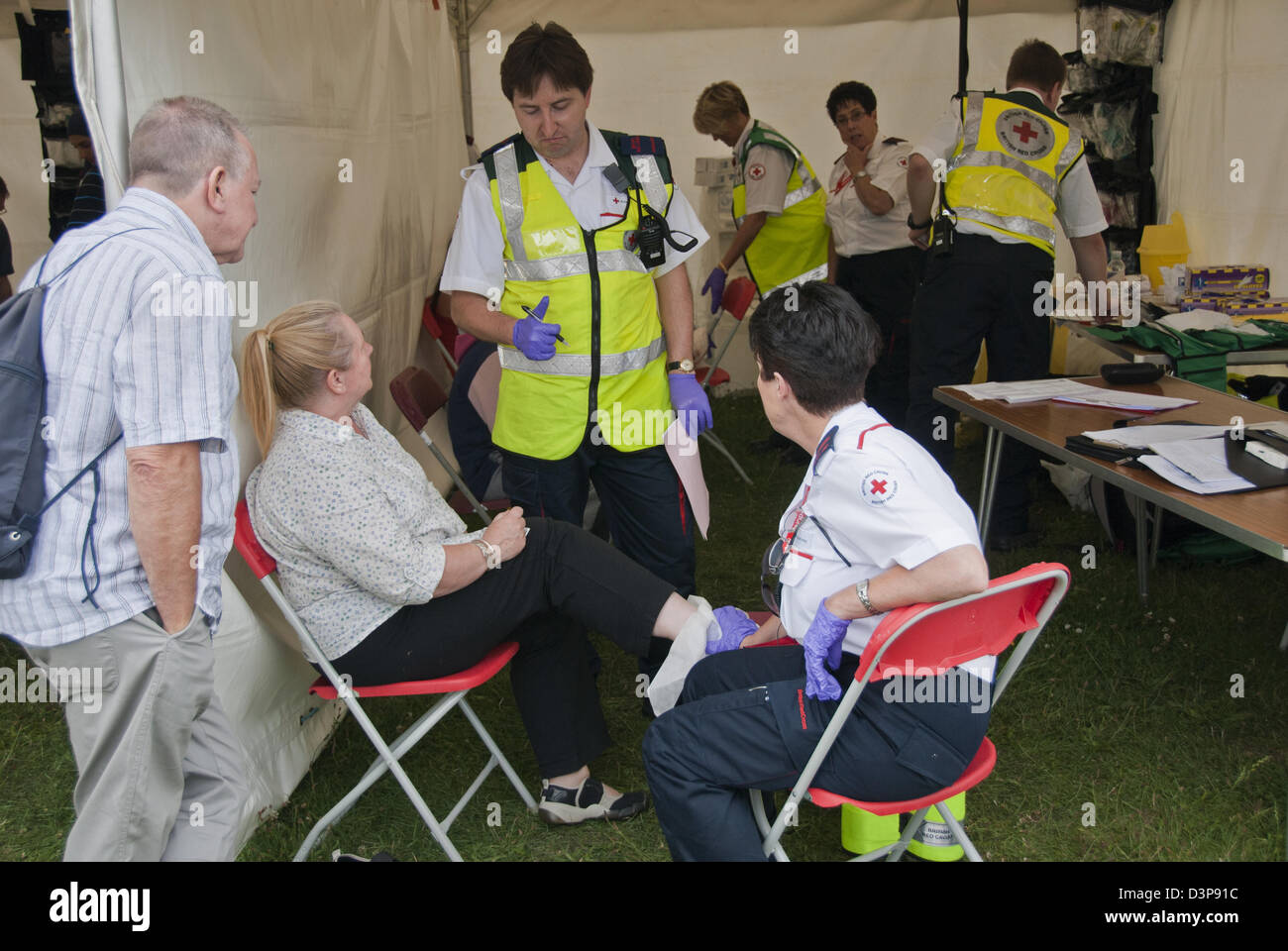 AMBULANCE AND FIRST AID CREW IN THE HEALTH INFORMATION TENT GIVING ...