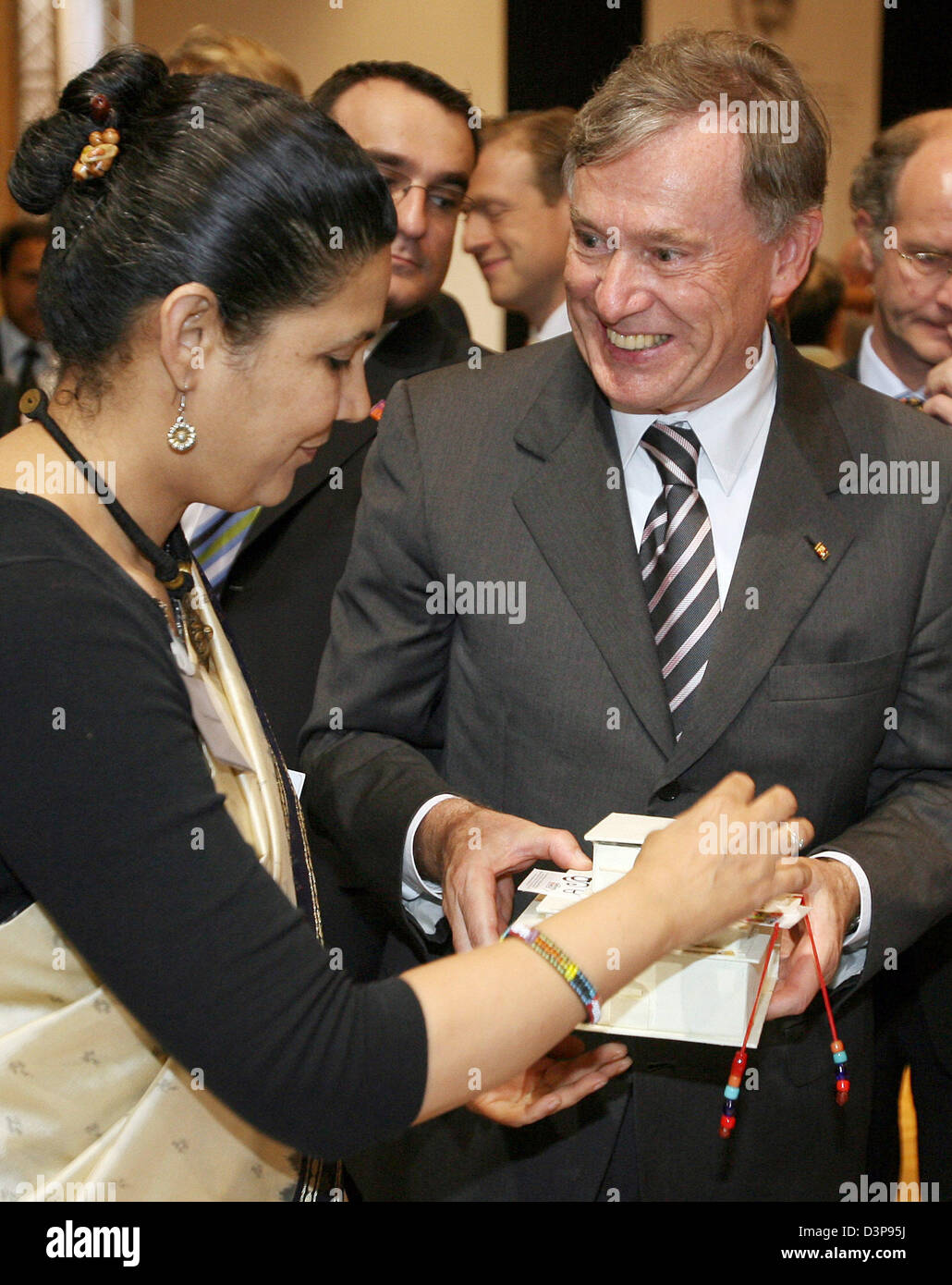 German President Horst Koehler receives a gift duirng his tour through ...