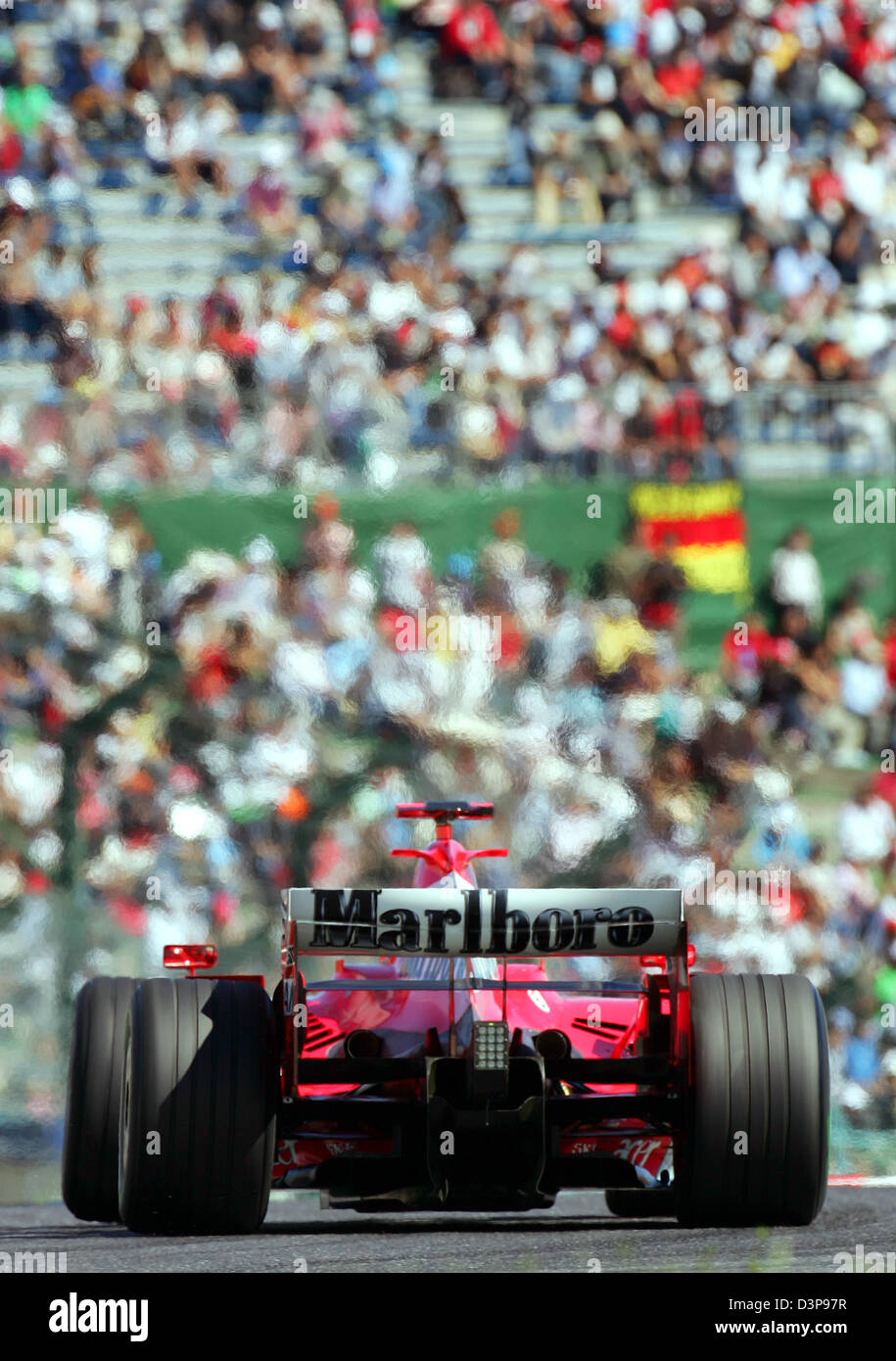 German Formula One pilot Fernando Alonso of Ferrari F1 steers his car ...