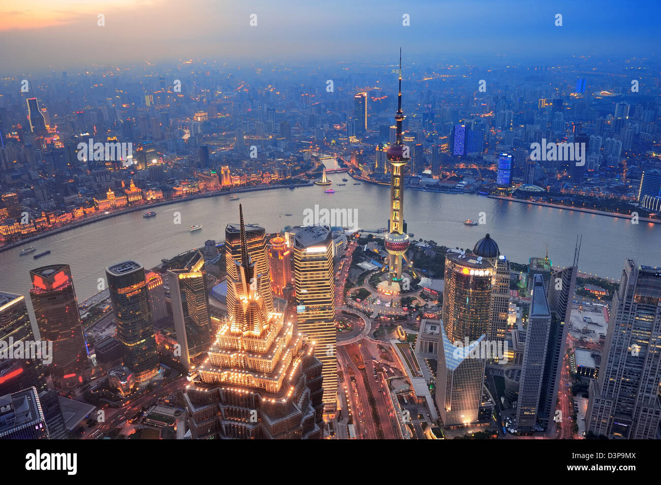 Shanghai aerial view at sunset with urban skyscrapers over river Stock ...