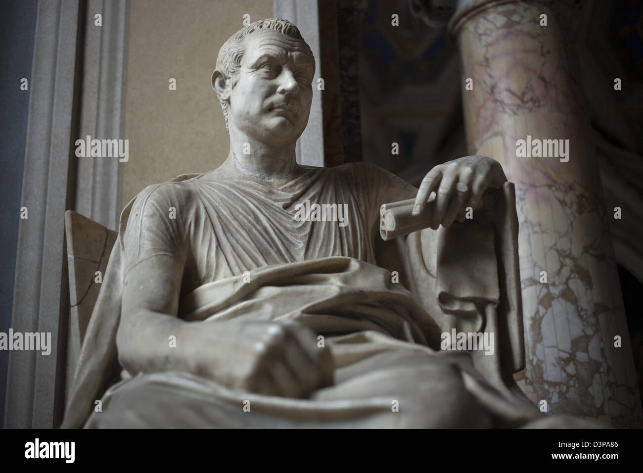 Roman statue of a reclining man on display in the Vatican museum in ...