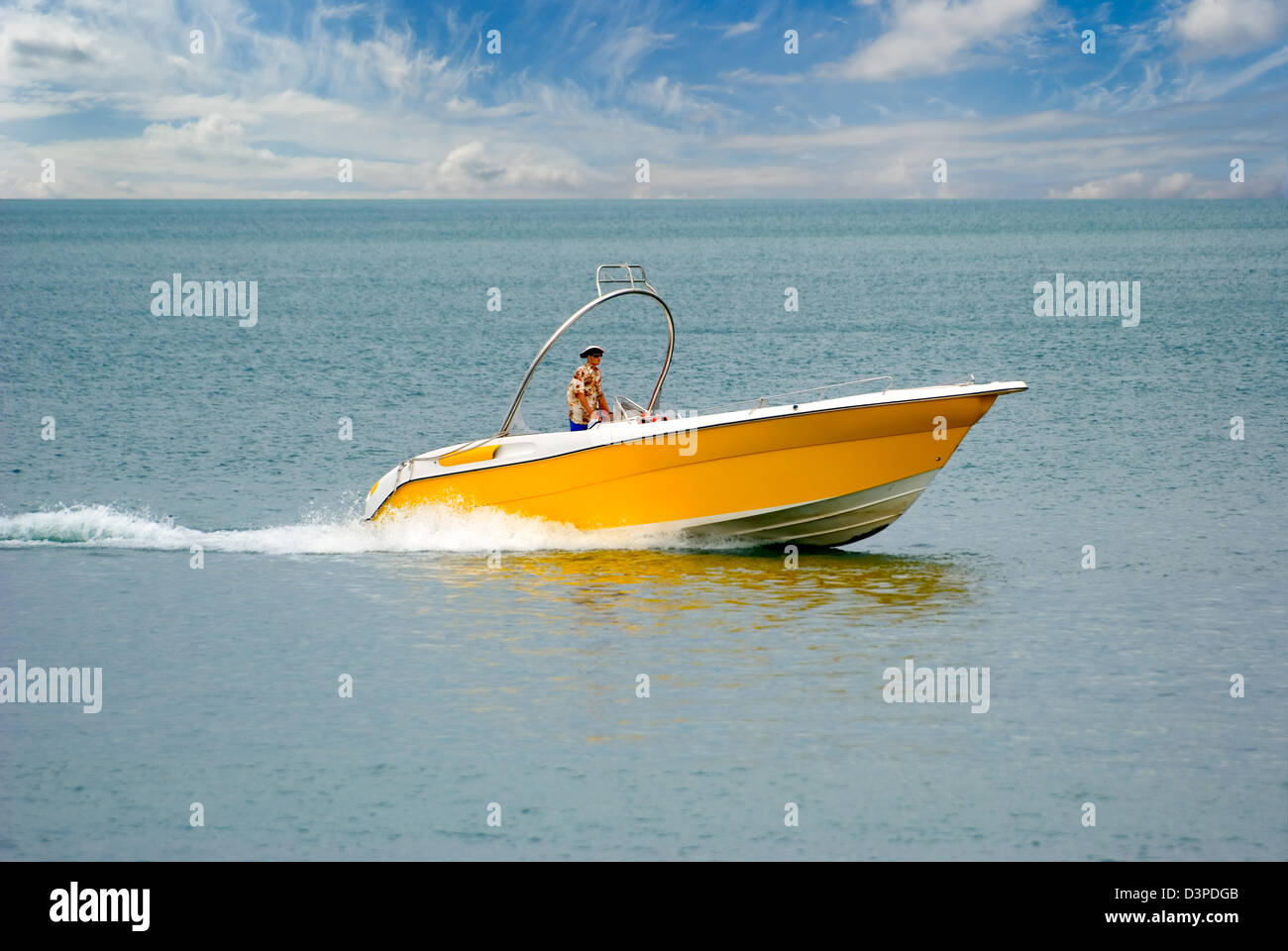 The yellow speed-boat floating on a sea Stock Photo - Alamy