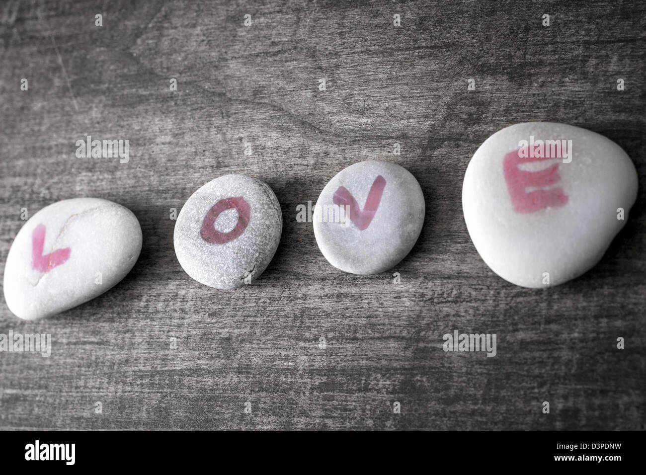 Love message on stone hi-res stock photography and images - Alamy