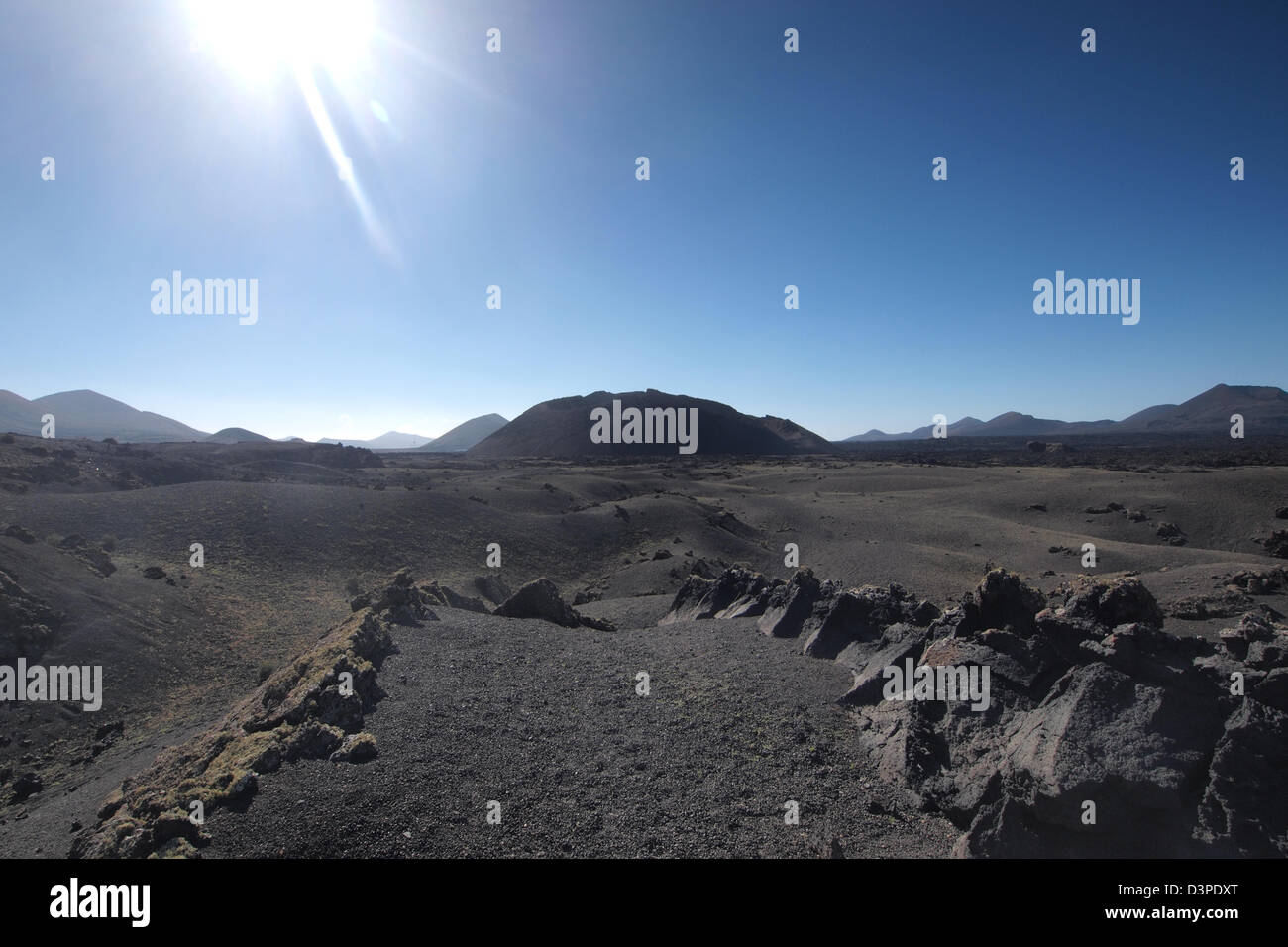old dried lava flow fields in timanfaya, lanzarote spain Stock Photo ...