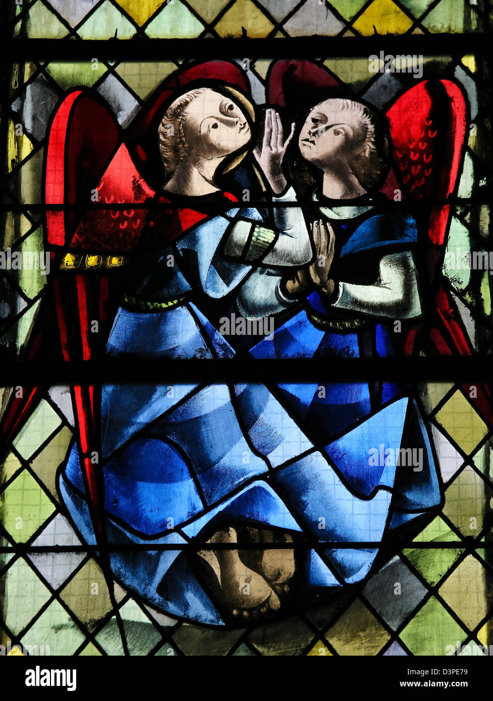 Two angels on a stained glass in the cathedral of Rouen, France Stock ...
