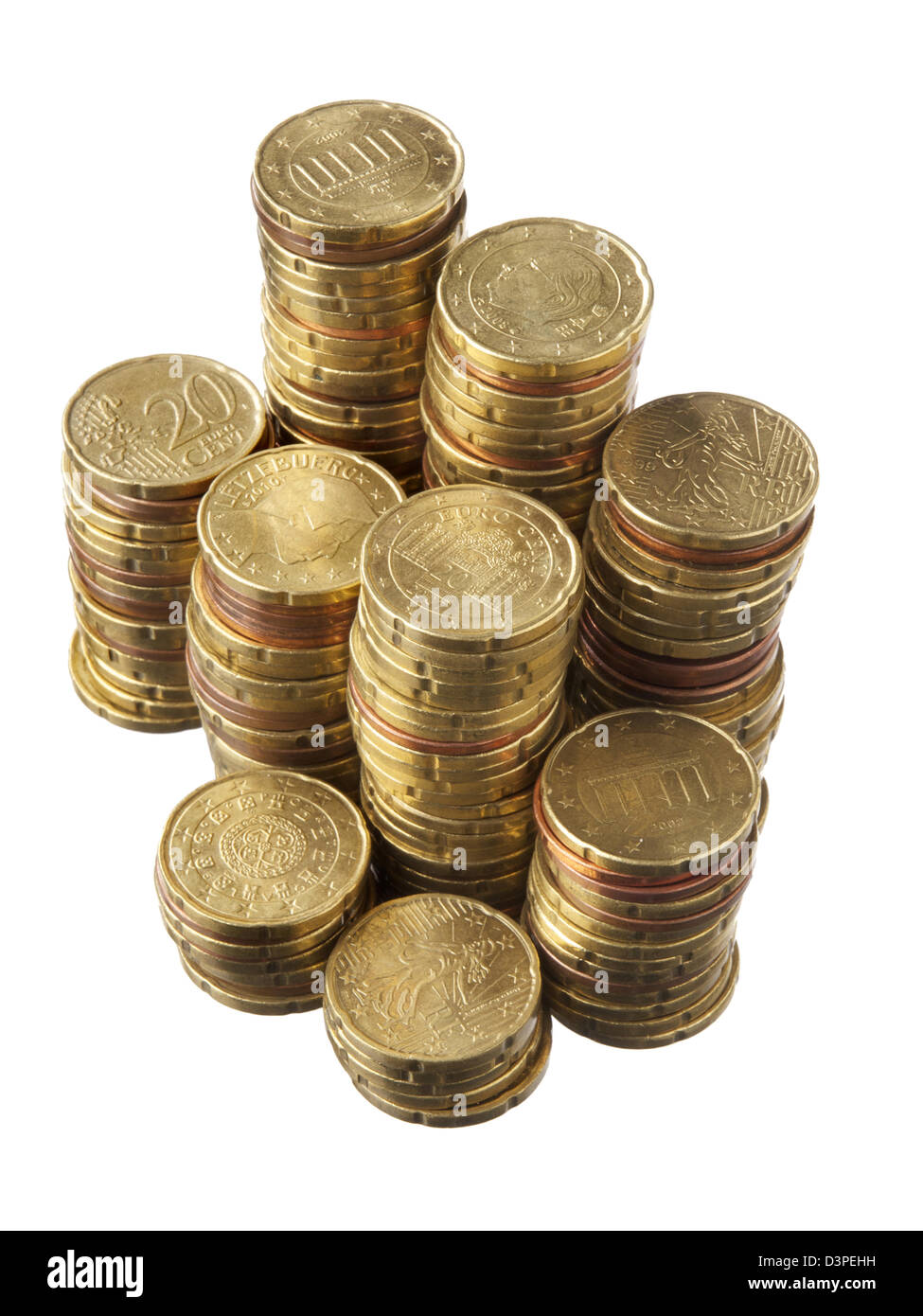 Small change, lots of Euro coins stacked, on white background with ...
