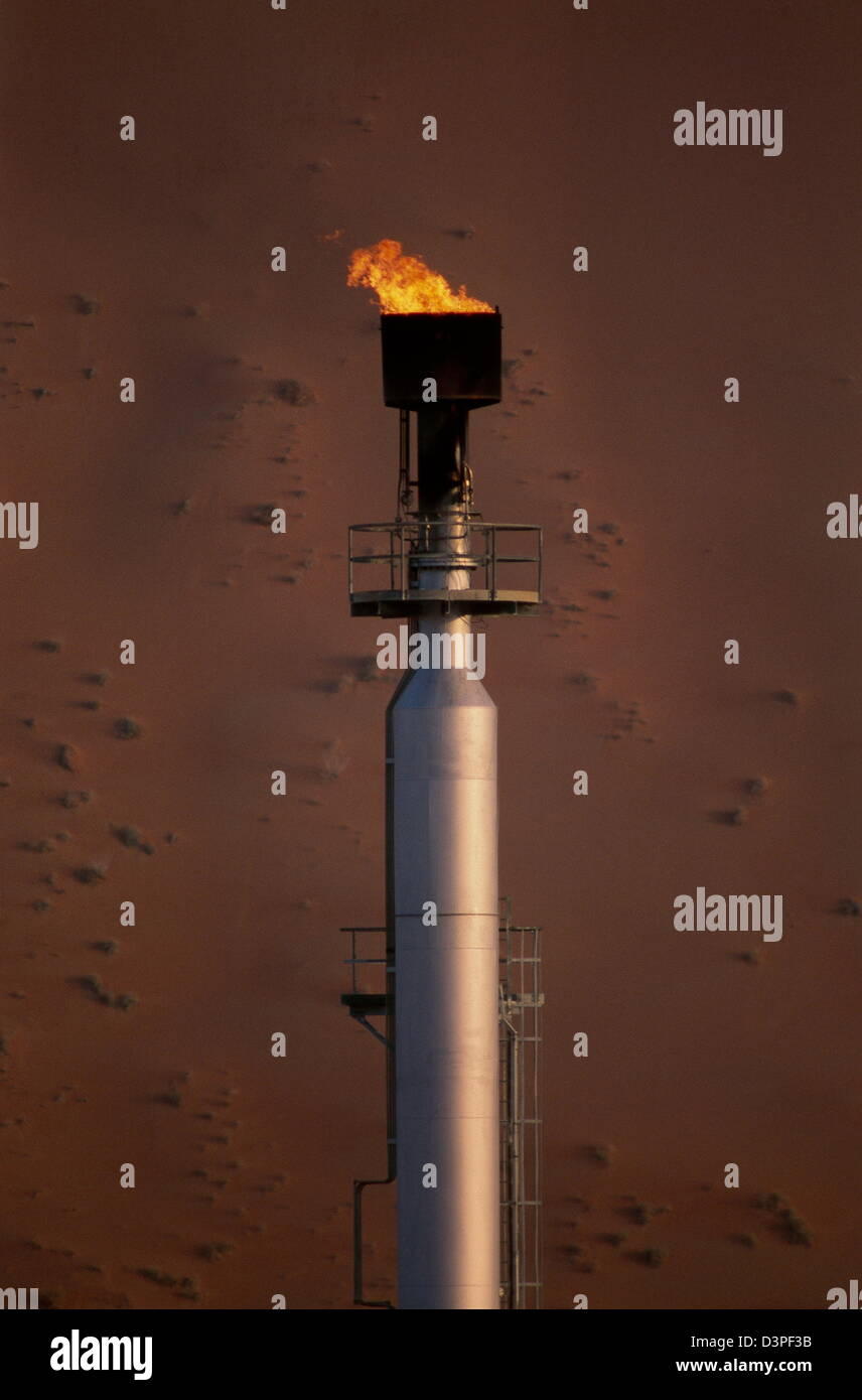 A gas flare at the Shaybah Gas Oil Separation Plant (GOSP), owned and ...