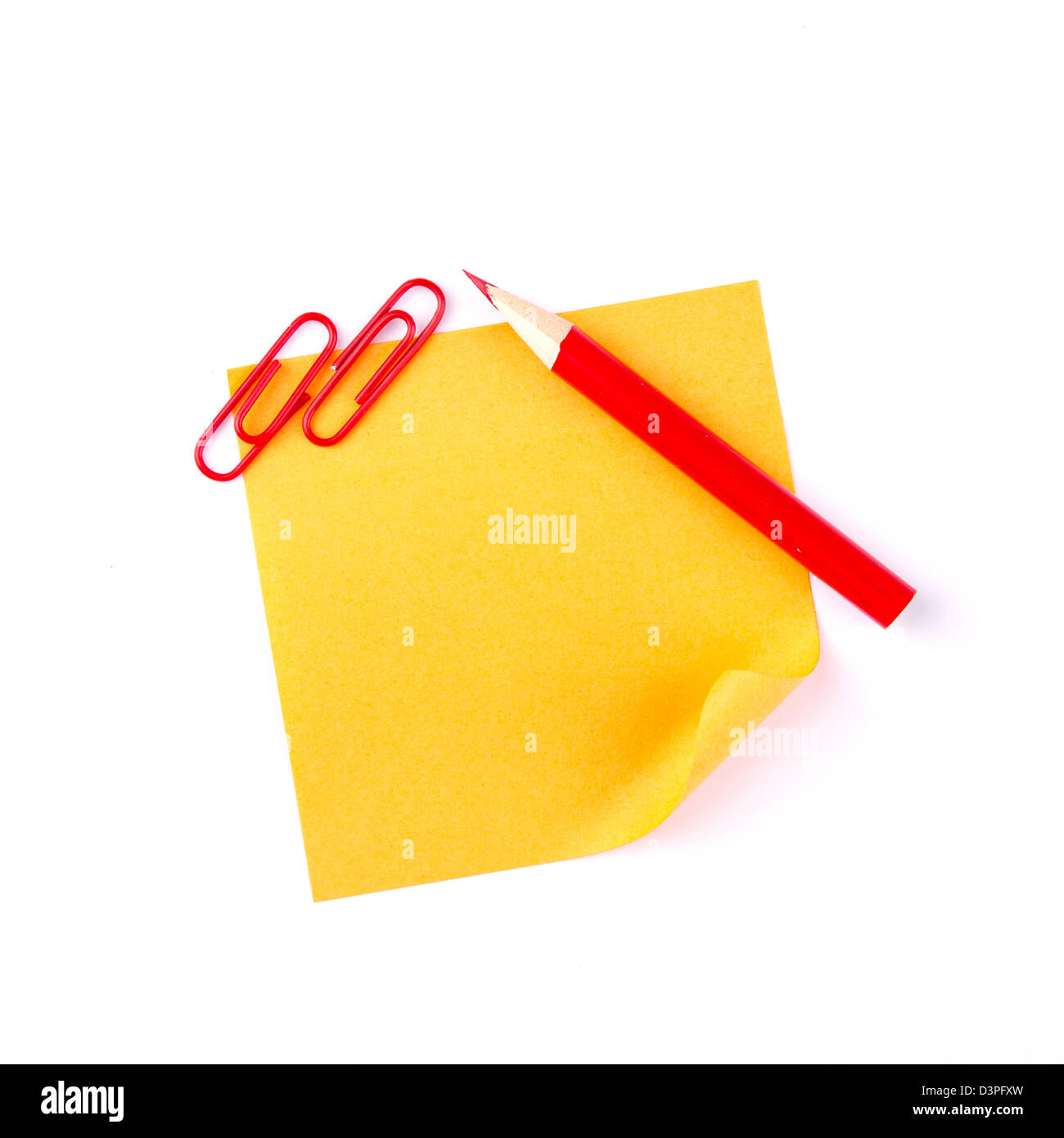 Orange sticky paper note with red clips and pencils isolated on white ...