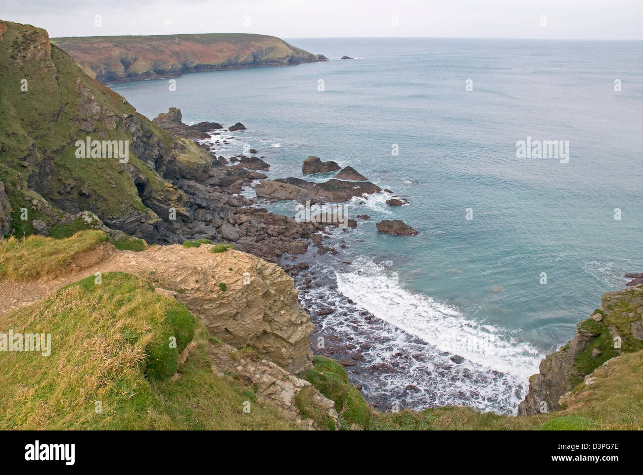 On the South West Coast Path at Hells Mouth in north Cornwall, looking ...
