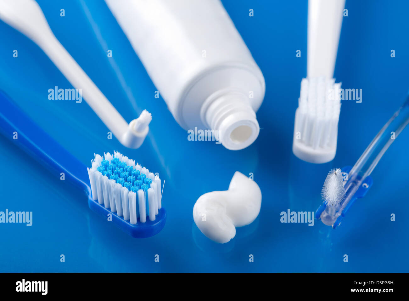 various toothbrushes and paste Stock Photo - Alamy