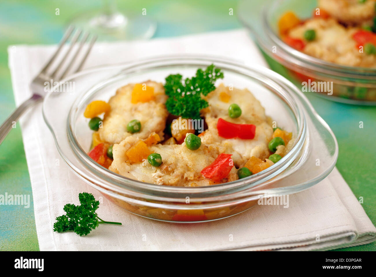 Monkfish with vegetables and curry. Recipe available Stock Photo - Alamy