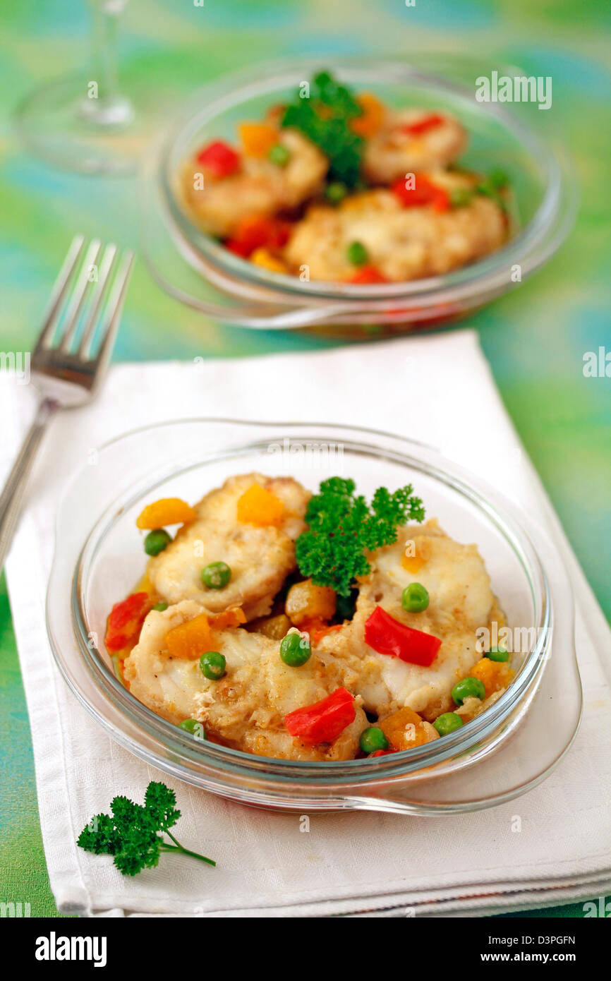 Monkfish with vegetables and curry. Recipe available Stock Photo - Alamy