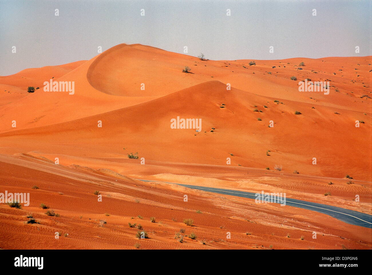 Aerial view of the massive red dunes and sabkha flats near the Shaybah ...