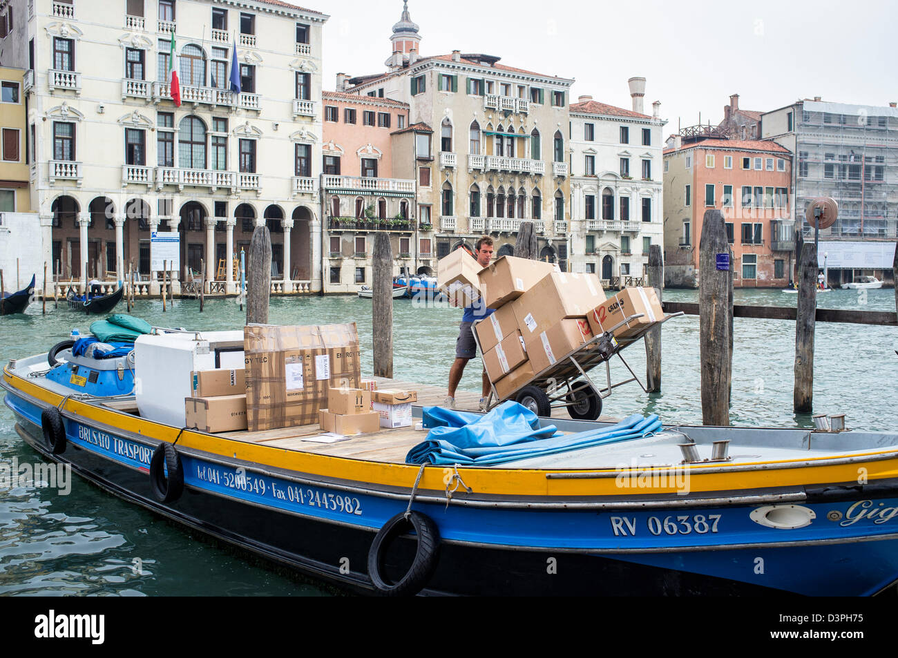 Man on canal barge hi-res stock photography and images - Alamy
