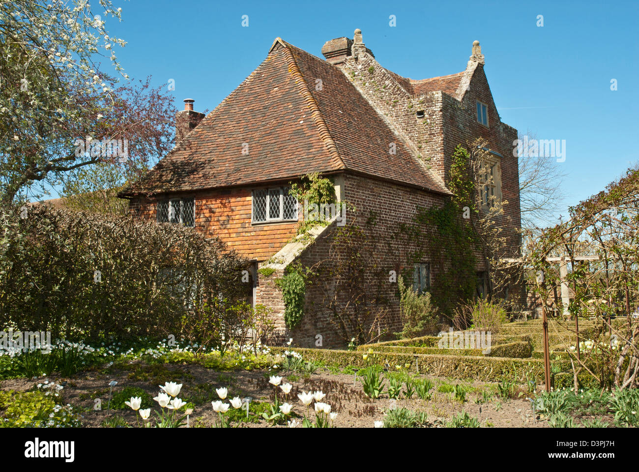 Sissinghurst historic Castle, House and gardens in spring. Sunny day ...