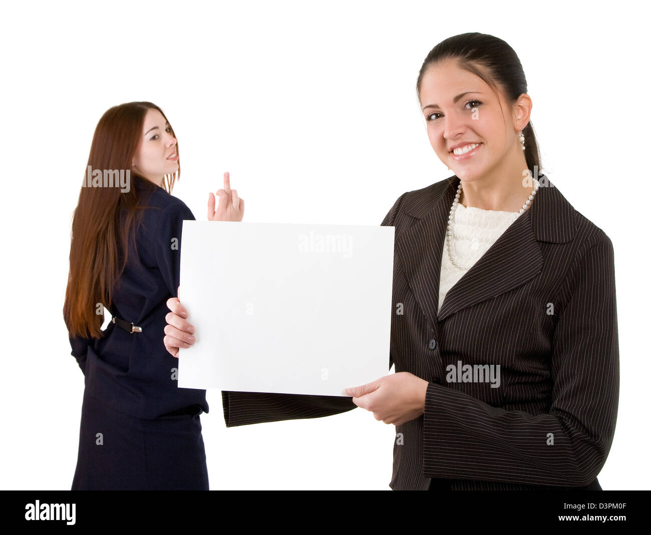 Woman with sign, other woman making face or gesture Stock Photo - Alamy