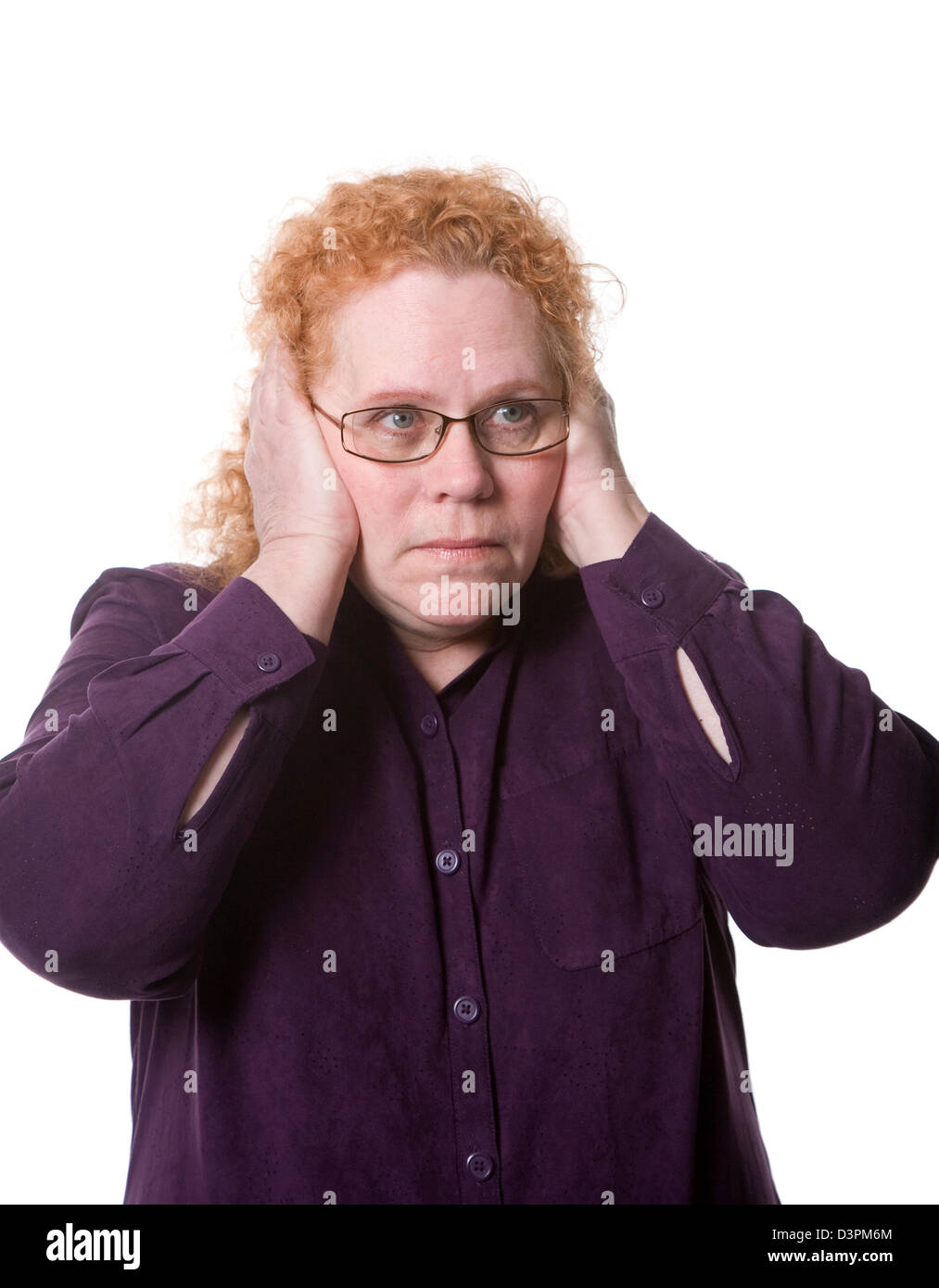 Woman covering her ears Stock Photo - Alamy