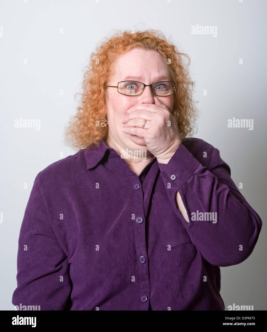 Woman hand covering mouth glasses hi-res stock photography and images ...