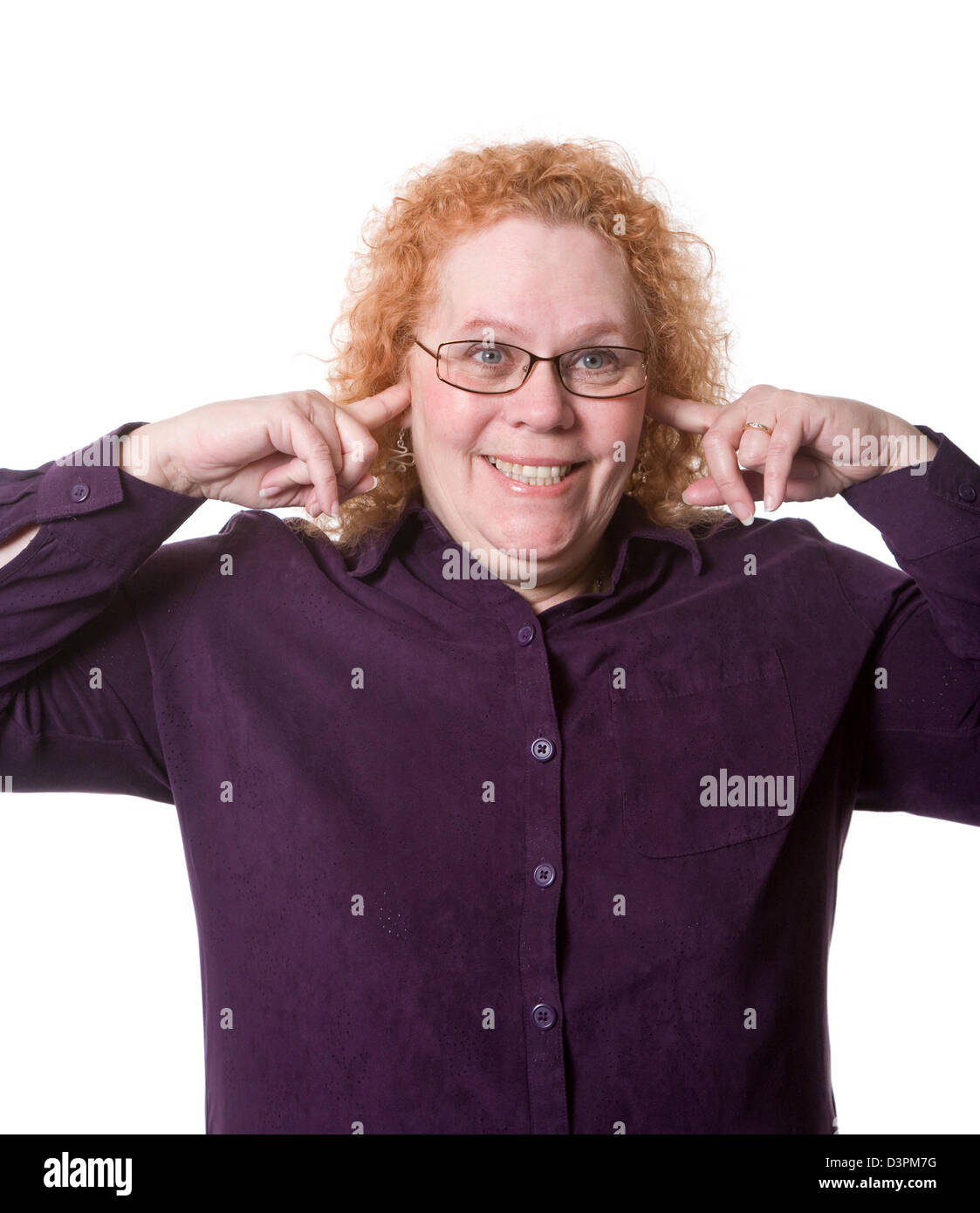 Woman covering her ears Stock Photo - Alamy
