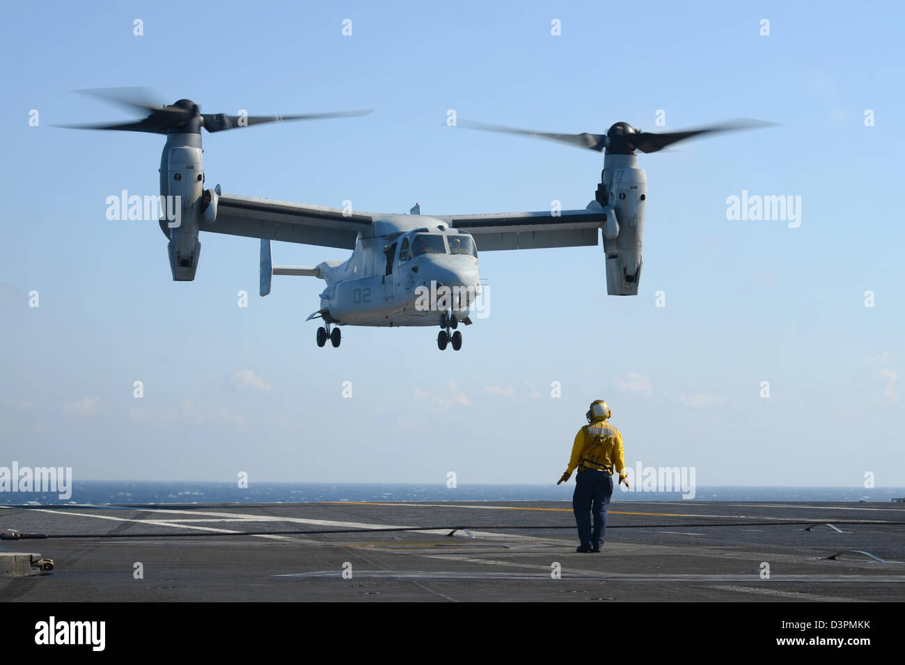 A US Marine Corp MV-22 Osprey Tilt rotor aircraft approaches the flight ...