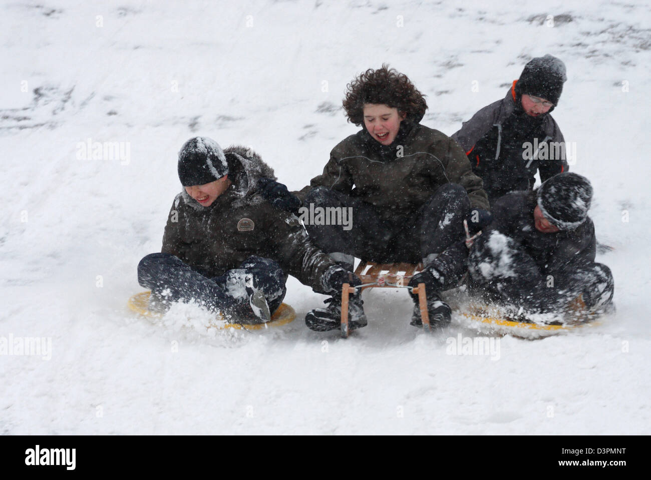 Leipzig, Germany, guys sleigh ride together Stock Photo - Alamy
