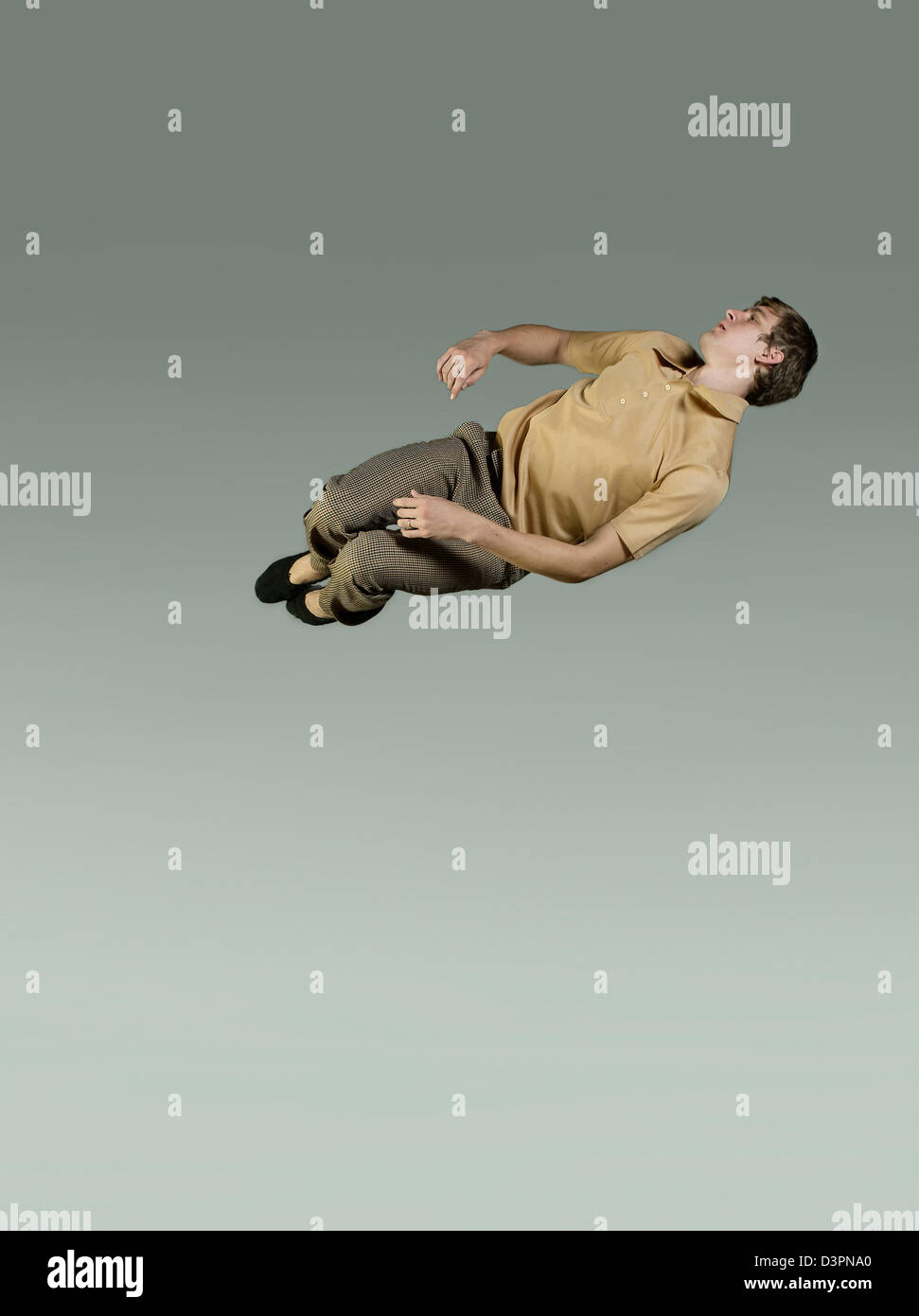 Humans floating frozen in mid air Stock Photo - Alamy
